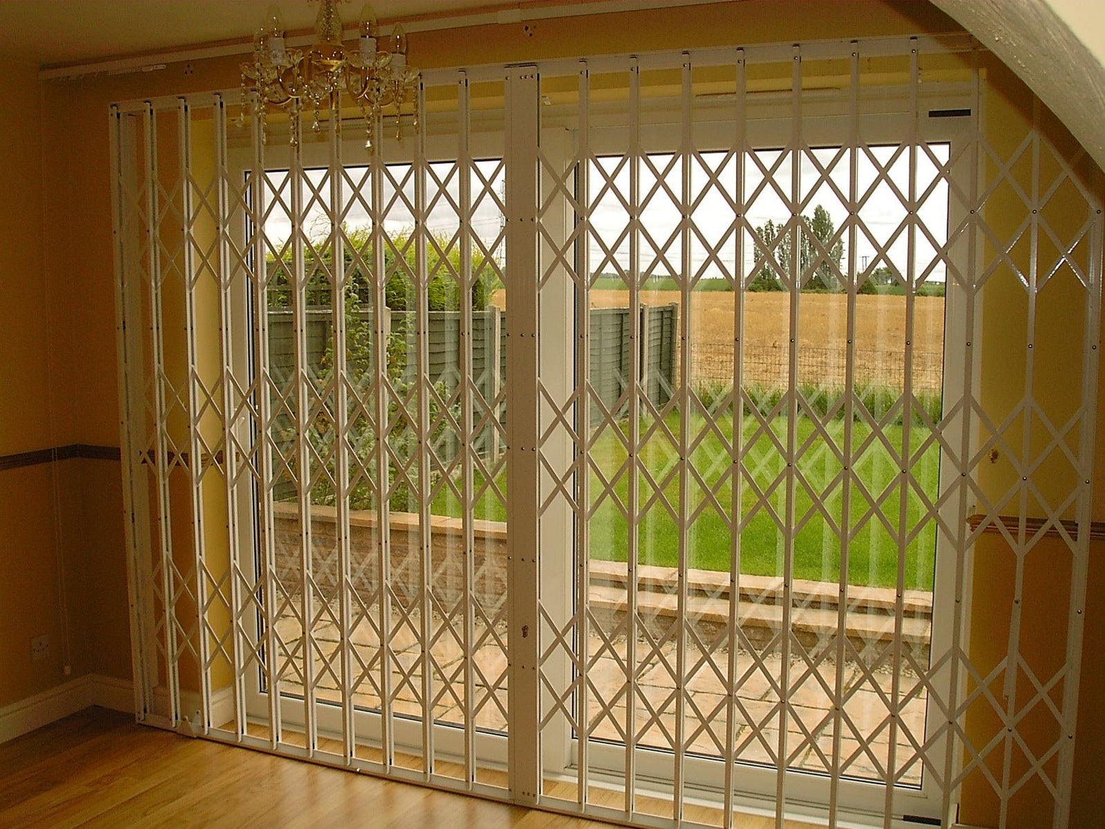 Concertina Retractable Security Grilles — Britannia Retail