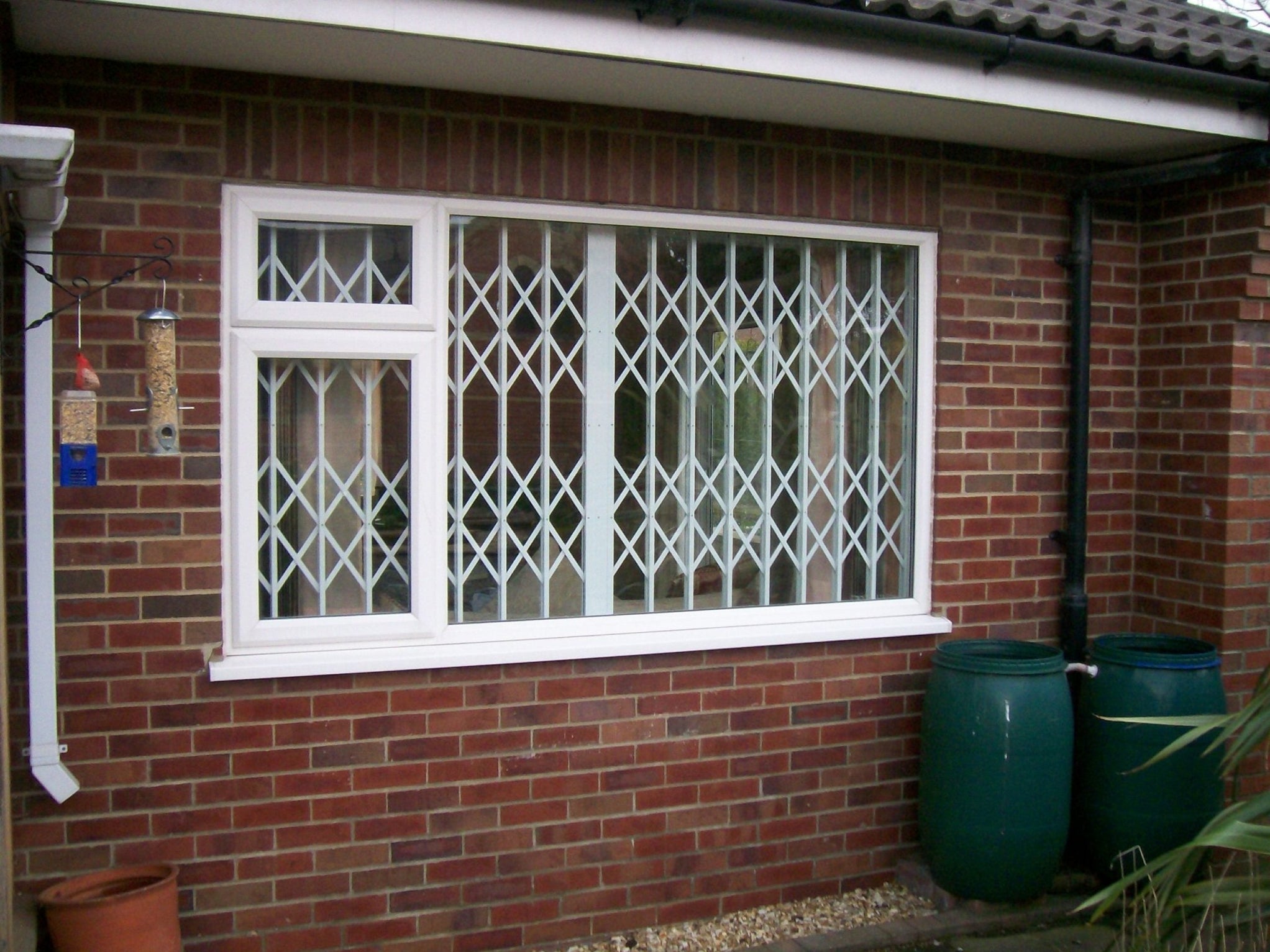 Concertina Retractable Security Grilles — Britannia Retail